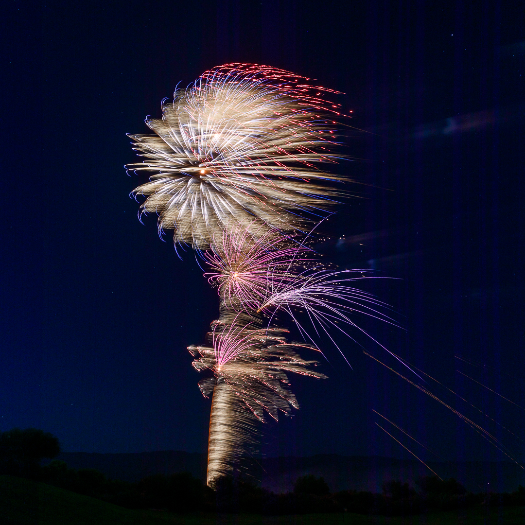 Fireworks on a windy desert evening.